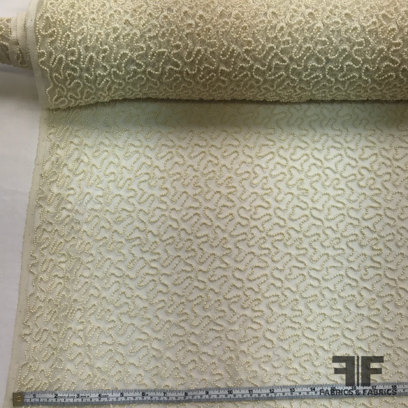 Couture Swivel Beaded Netting - Ivory – Fabrics & Fabrics
